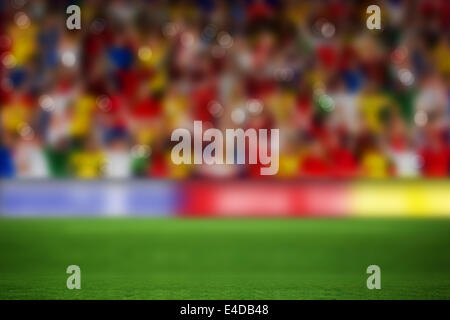 Blurry football pitch with crowd Stock Photo - Alamy