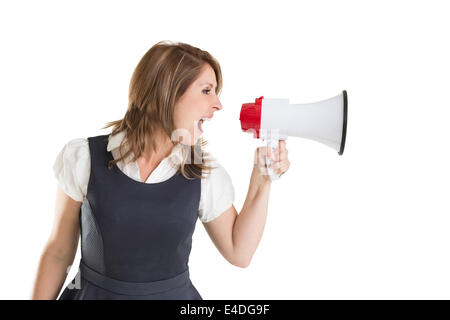 Young businesswoman shouting into bullhorn Stock Photo - Alamy