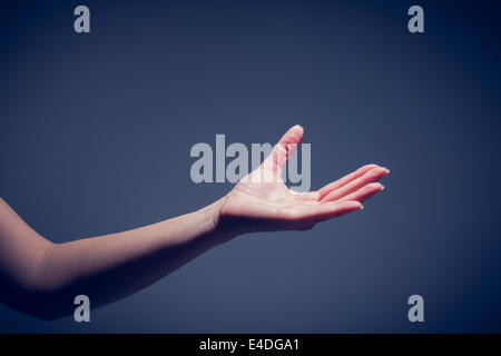 Female hand being held out Stock Photo - Alamy