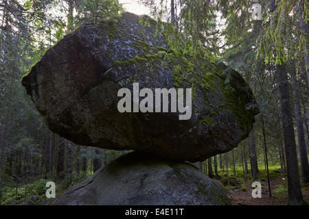 Kummakivi, balancing boulder on bedrock in Ruokolahti Finland Stock ...