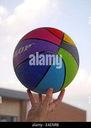 Basketball ball, red background. Spherical ball used in basketball ...