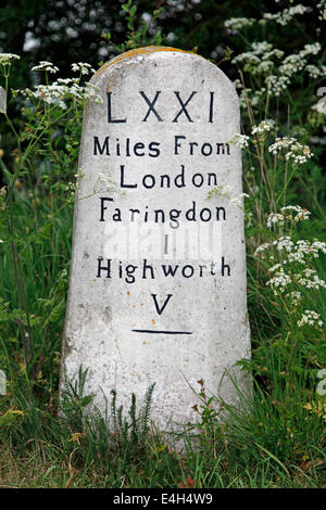 Old Milestone by the Roadside with distance to London marked Stock ...