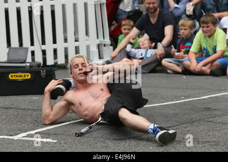 Aerial Manx performs his act including sword swallowing during the Laya ...