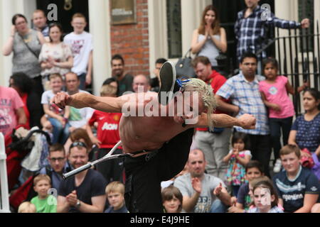 Aerial Manx performs his act including sword swallowing during the Laya ...