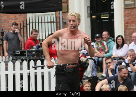 Aerial Manx performs his act including sword swallowing during the Laya ...