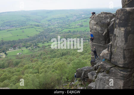 rock Climbers at Curbar Edge in the beautiful Peak District National ...