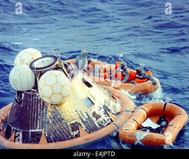 Astronauts of the Apollo 11 mission await recovery aboard a life raft ...