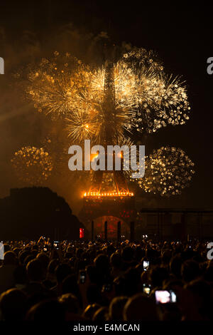 Fireworks explode around the Eiffel Tower during the annual Bastille ...