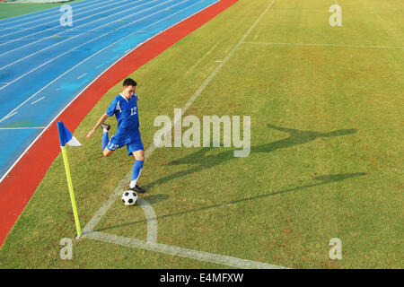 Soccer Player Taking Corner Kick Stock Photo - Alamy