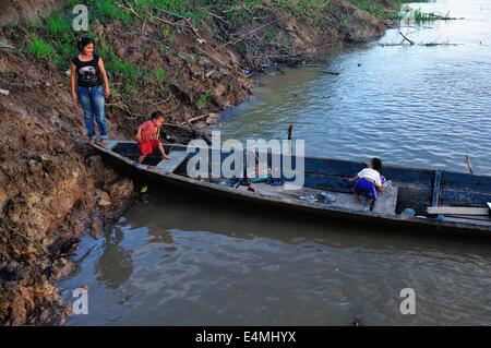 Children fishing in the Amazon River MONTEALEGRE State of Pará. BRAZIL ...