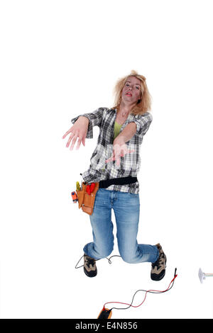 A woman being electrocuted Stock Photo - Alamy