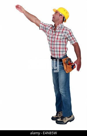 Professional Construction Contractor Worker Reaching Ceiling Beams From ...