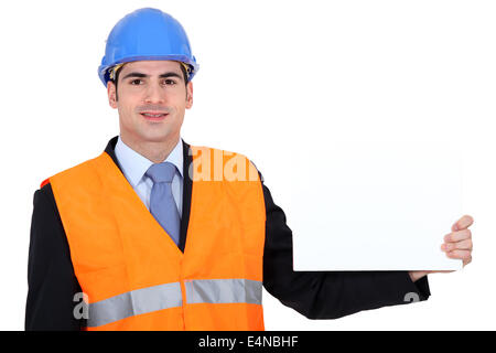 Architect presenting a poster Stock Photo - Alamy