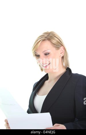 Attractive lady reading letter on couch Stock Photo - Alamy