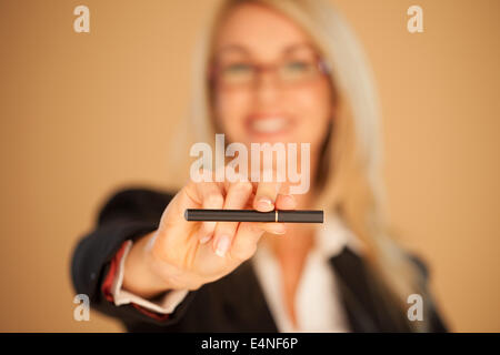 Woman offering a cigarette Stock Photo - Alamy