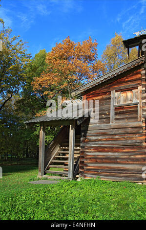 rural wooden house amongst autumn wood Stock Photo - Alamy