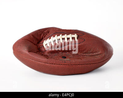 One deflated American football ball isolated on white Stock Photo - Alamy