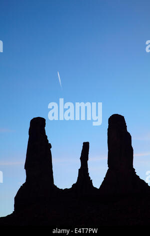 The Three Sisters, a rock spire formation in Monument Valley Tribal ...