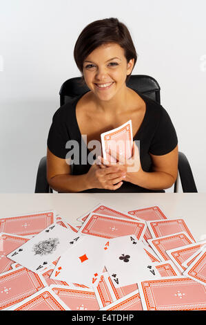 happy female magician doing a trick in a stage Stock Photo - Alamy