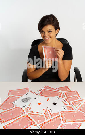 happy female magician doing a trick in a stage Stock Photo - Alamy