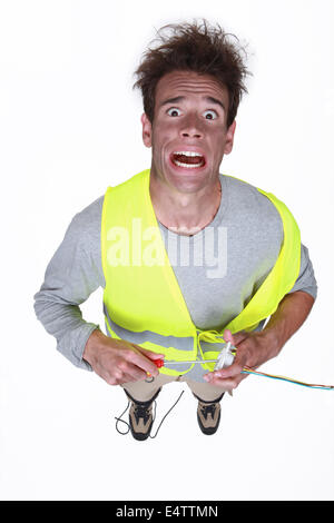 Man being electrocuted Stock Photo - Alamy