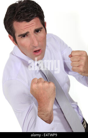 portrait of a very young businessman determined to succeed Stock Photo ...