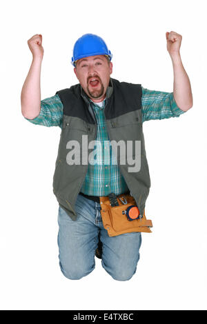 Builder losing his mind Stock Photo - Alamy
