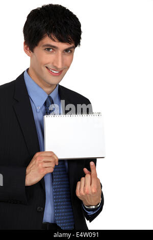 A businessman pointing at to do list with a finger Stock Photo - Alamy