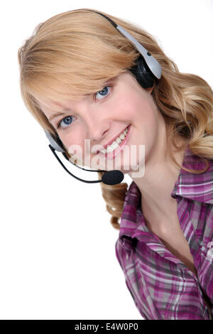 Portrait of female tech support worker in classic outfit wearing black ...