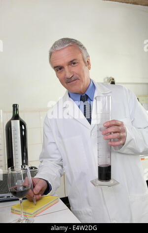 an oenologist and a wine producer Stock Photo - Alamy