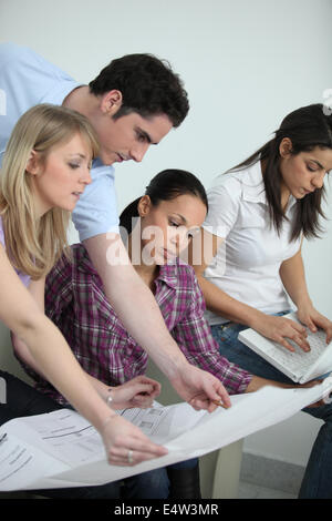 Workgroup in study room Stock Photo - Alamy