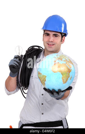 Electrician with globe Stock Photo - Alamy