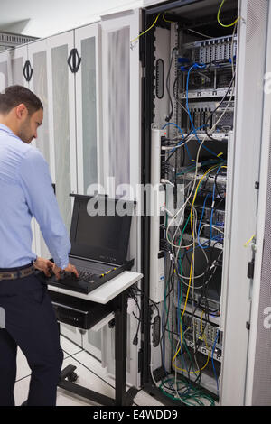 Man repairing servers Stock Photo - Alamy
