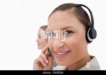 Sales persons using headsets Stock Photo - Alamy