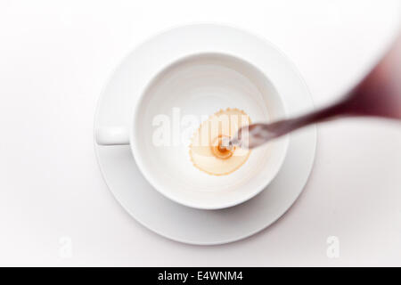 Empty coffee cup being filled Stock Photo - Alamy