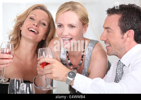 Three beautiful woman celebrating a party and having fun Stock Photo ...