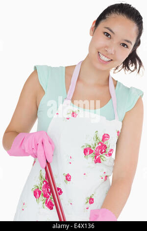 Young woman mopping smiling Stock Photo - Alamy