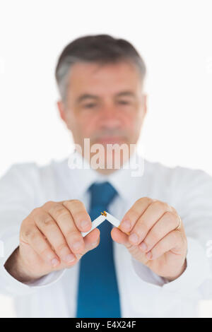 Short cigarette on white background Stock Photo - Alamy