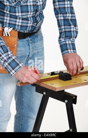 A foreman taking measure Stock Photo - Alamy