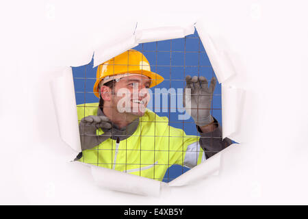Trapped construction worker Stock Photo - Alamy
