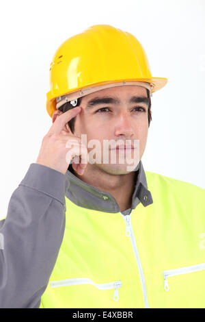 Construction worker carpenter thinking isolated on white background ...