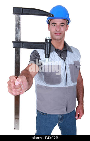 Worker holding calipers Stock Photo - Alamy