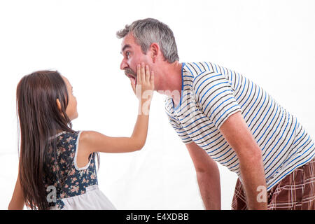 Female child slapping father across face, dad shocked Stock Photo - Alamy