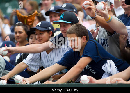 Baseball fans trying to get autographs Stock Photo - Alamy