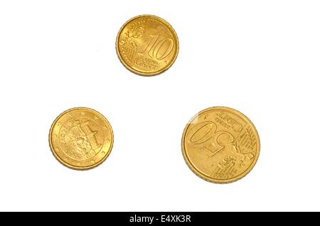 Three Small Gold Coins Stock Photo - Alamy