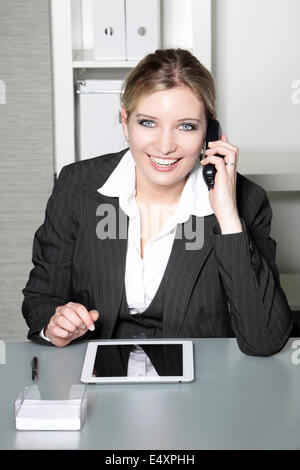 Executive taking a call Stock Photo - Alamy