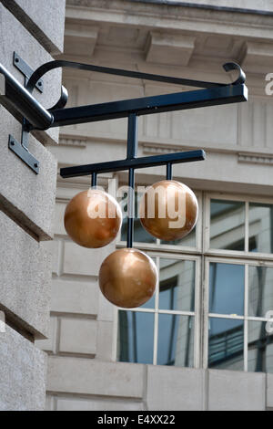 Three brass balls Traditional symbol of pawnbroker / pawn shop Stock ...
