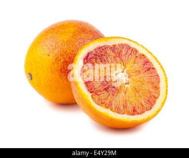 Isolated blood oranges. Whole red orange fruit and half with leaves ...