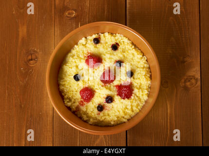 Millet porridge with berry Stock Photo - Alamy