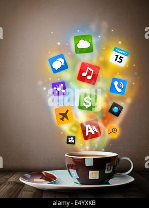 Coffee mug with colorful media icons Stock Photo - Alamy